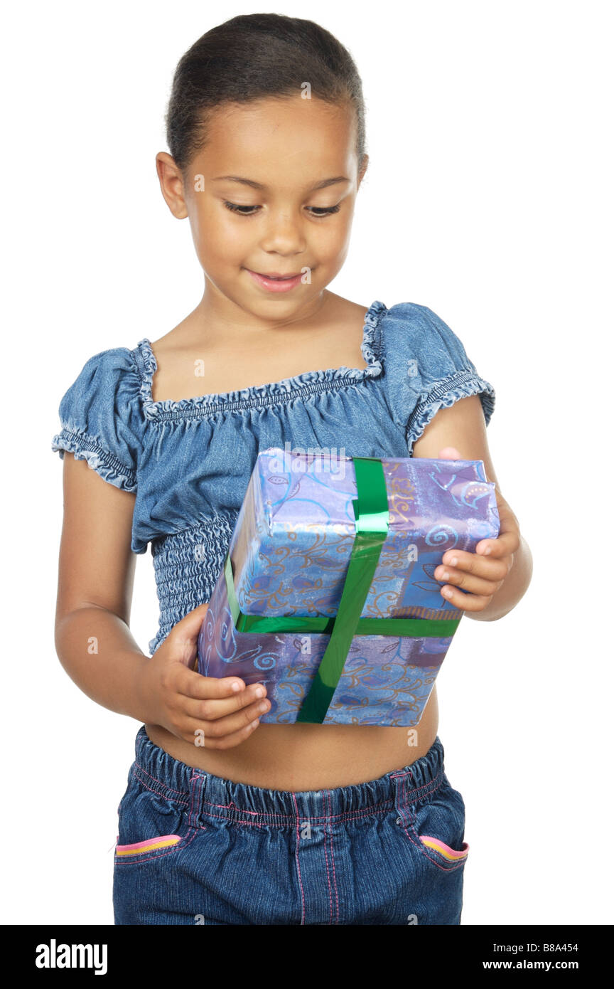 girl giving a gift a over white background Stock Photo - Alamy