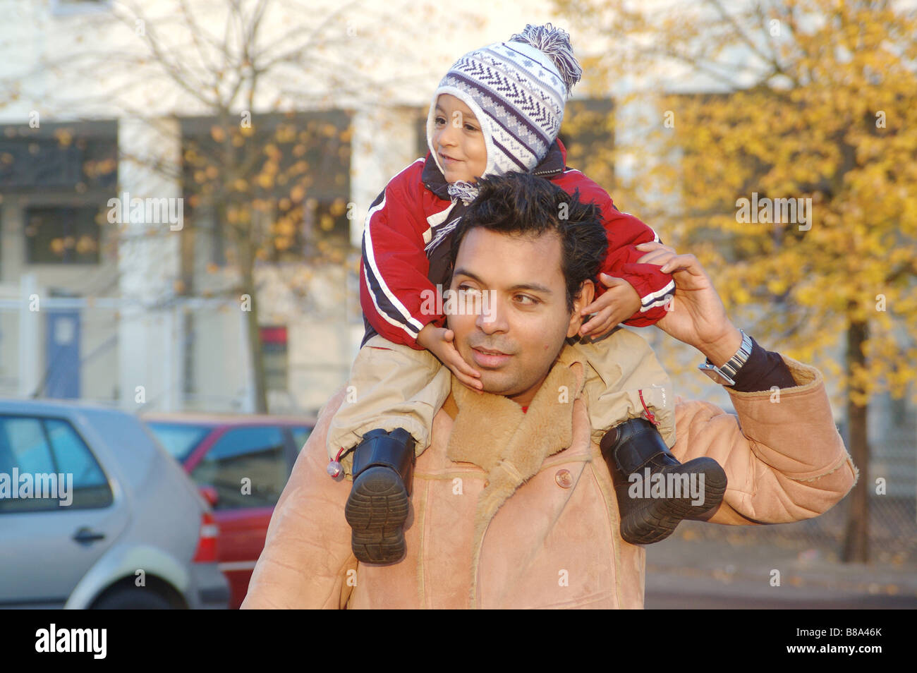 Father wearing clothes son on hi-res stock photography and images - Alamy