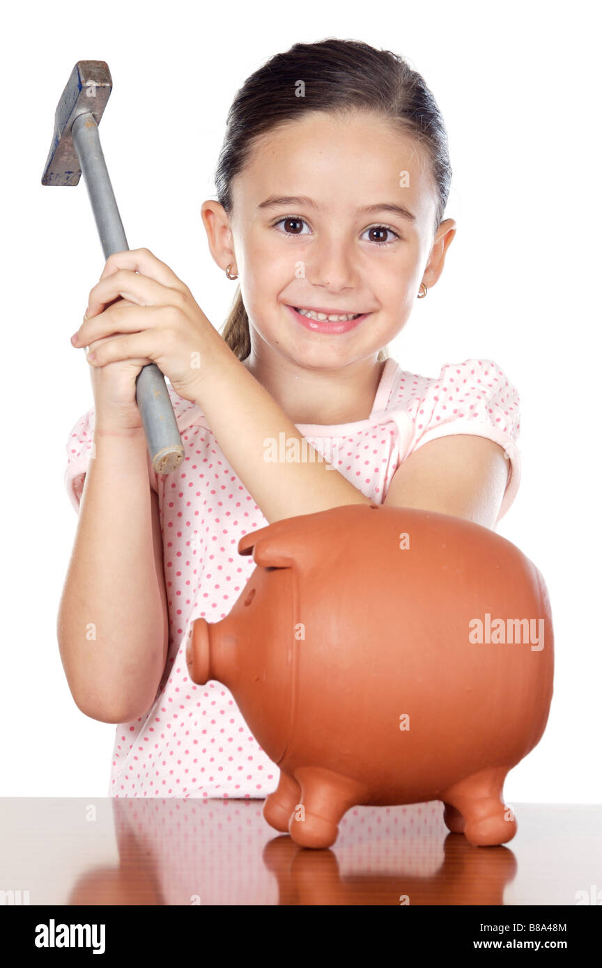 photo of an adorable boy breaking the money box Stock Photo - Alamy