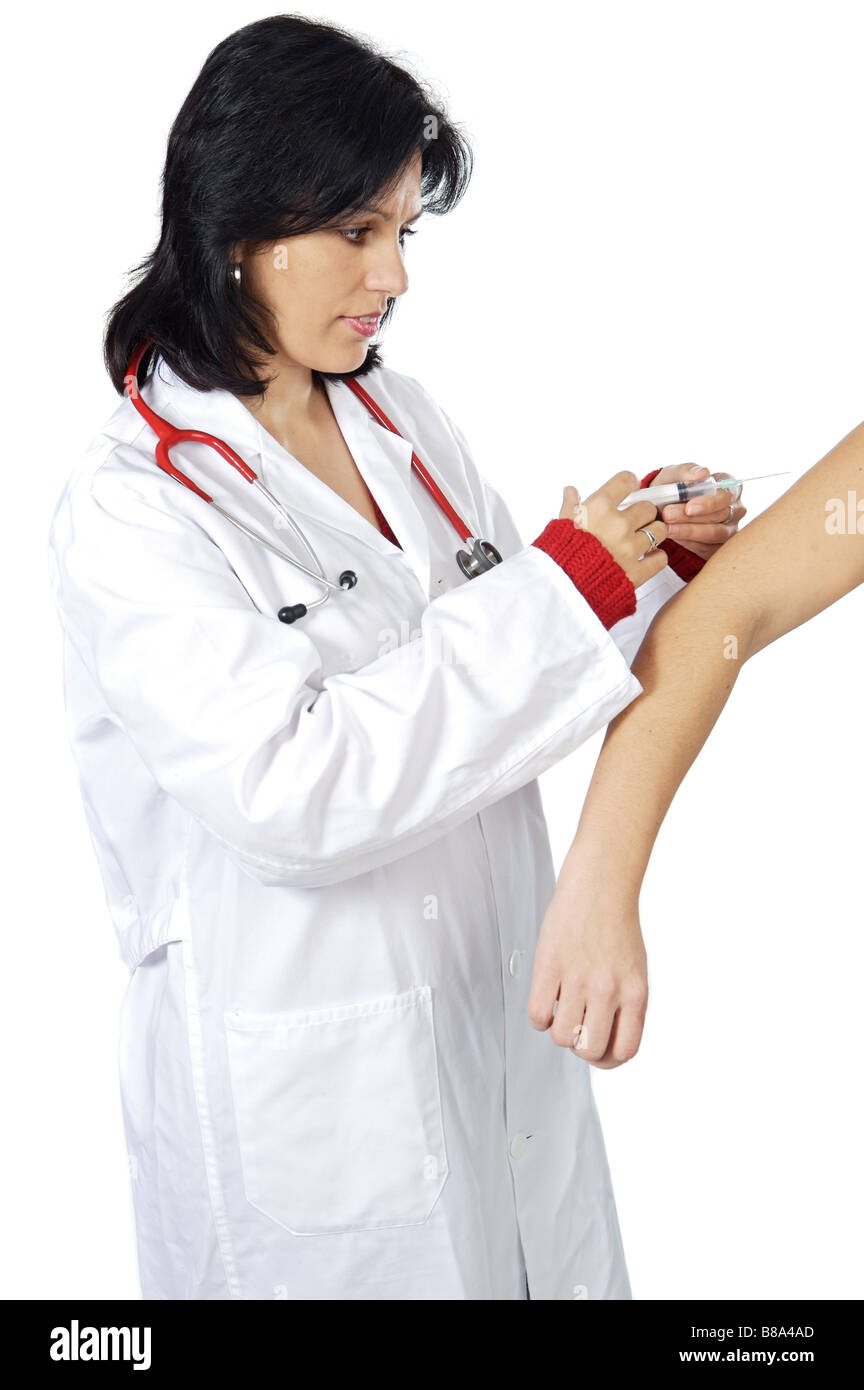 Attractive lady doctor over a white background Stock Photo - Alamy