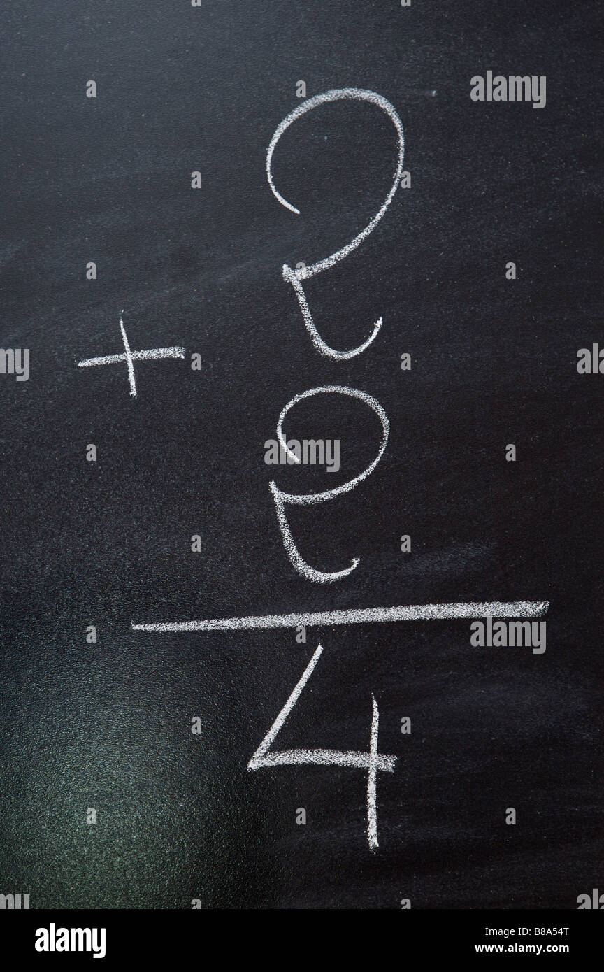 learning to add numbers in a black slate Stock Photo - Alamy