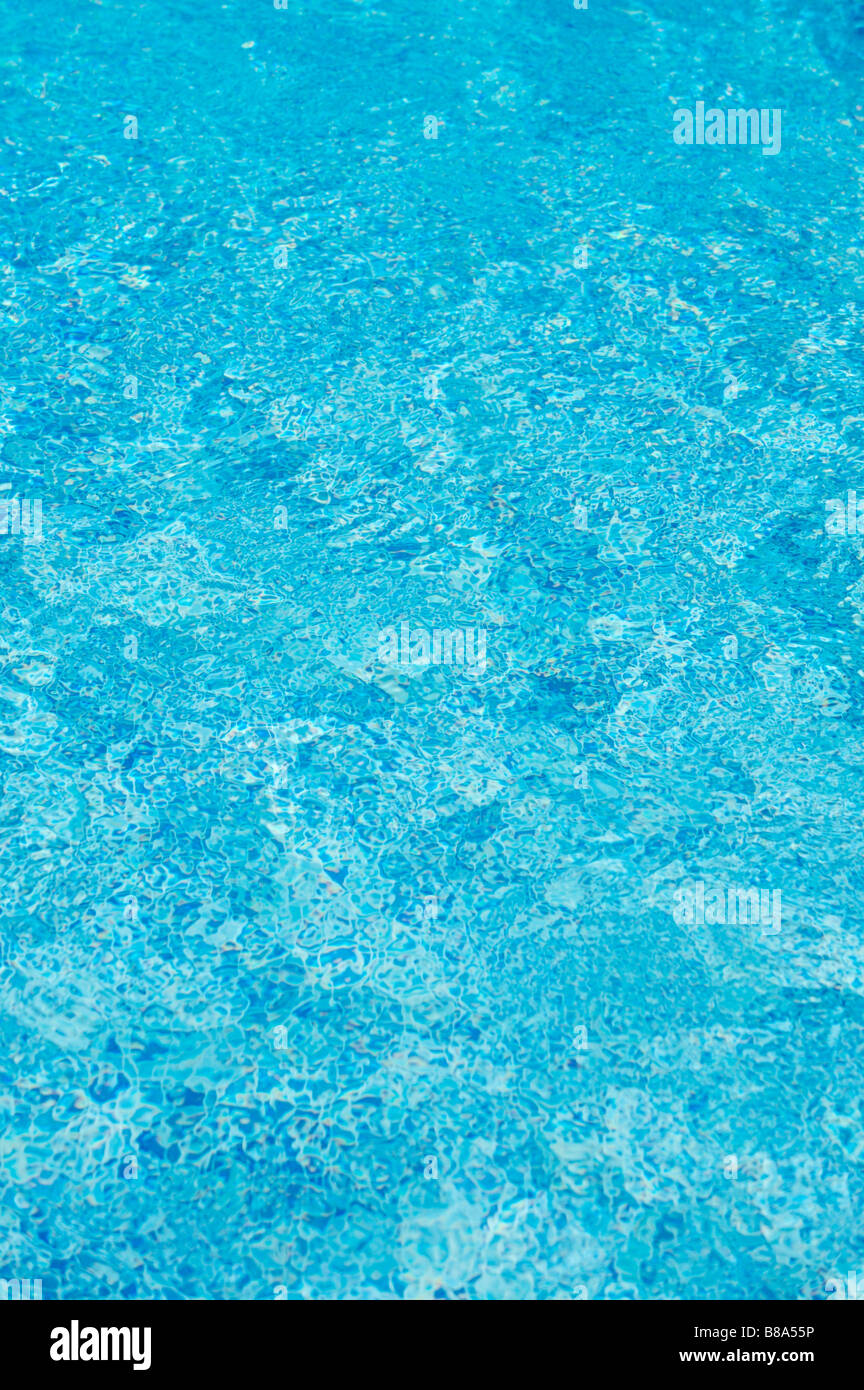 Refreshing water of swimming pool in summer Stock Photo - Alamy