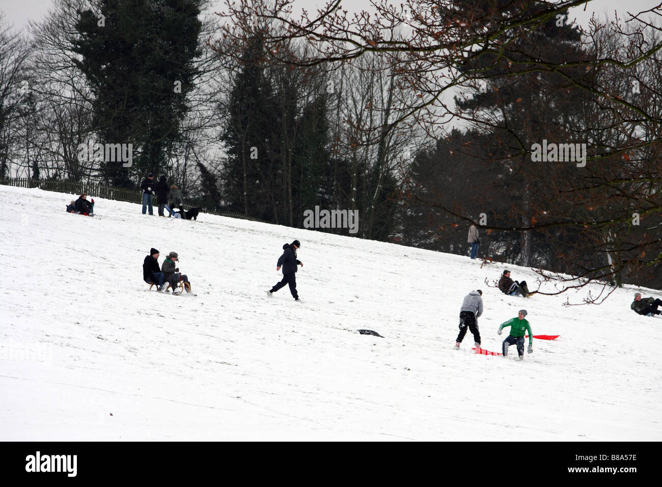 Kids playing snowmen in snowy hi-res stock photography and images - Alamy