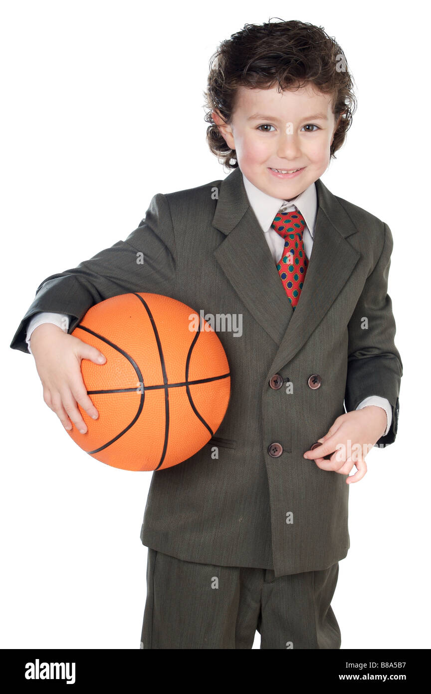 Adorable boy in a suit with basketball ball Stock Photo - Alamy