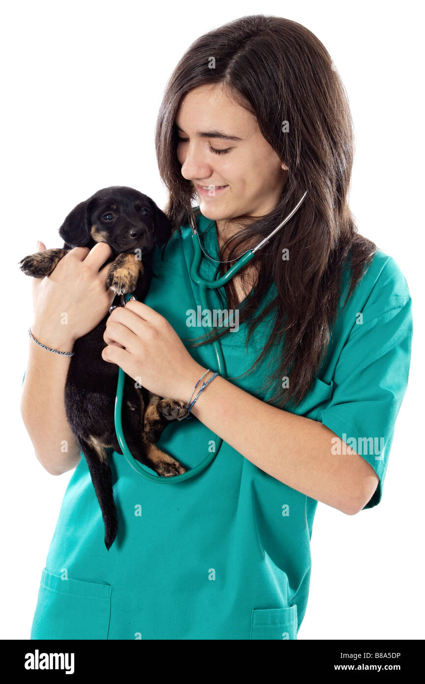 Attractive lady veterinarian over a white background Stock Photo - Alamy