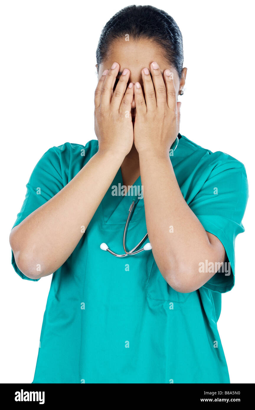 Lady anonymous Doctor with the hands in the face Stock Photo - Alamy