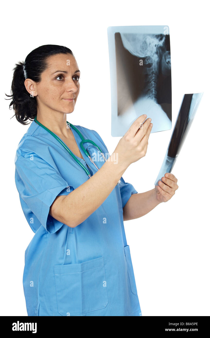 doctor examining a radio graphs a over white background Stock Photo - Alamy