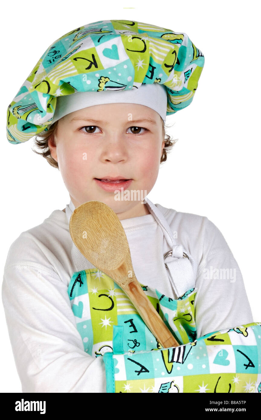 Adorable future cook a over white background Stock Photo - Alamy