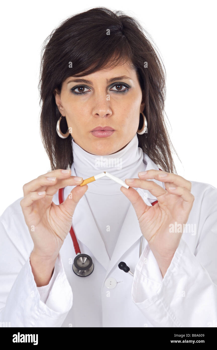 Attractive lady doctor over a white background Stock Photo - Alamy