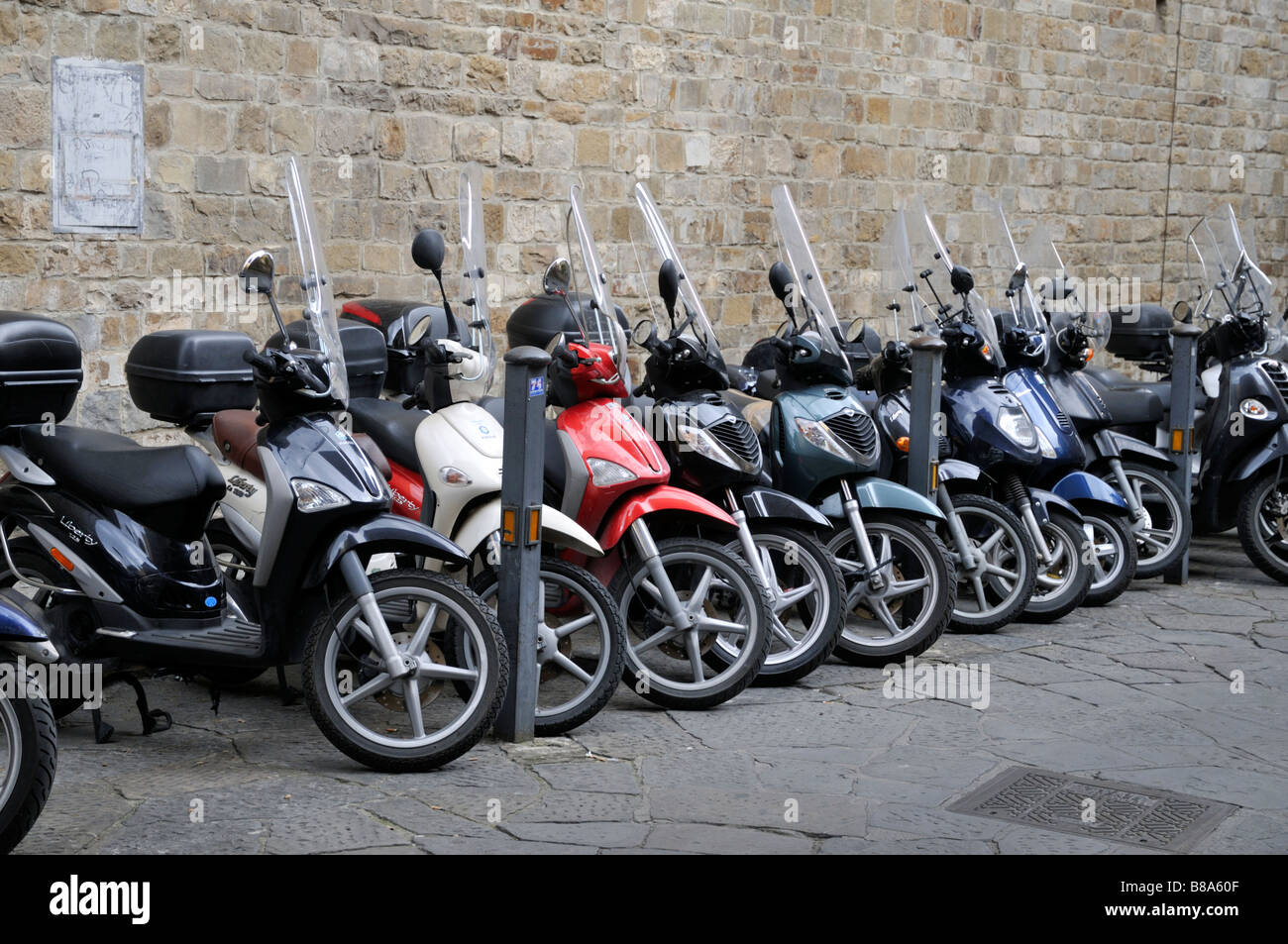 Row of scooters hi-res stock photography and images - Alamy