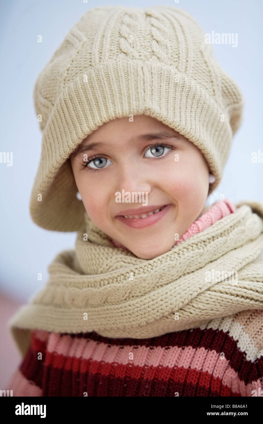 precious face of an adorable girl a over blue background Stock Photo ...