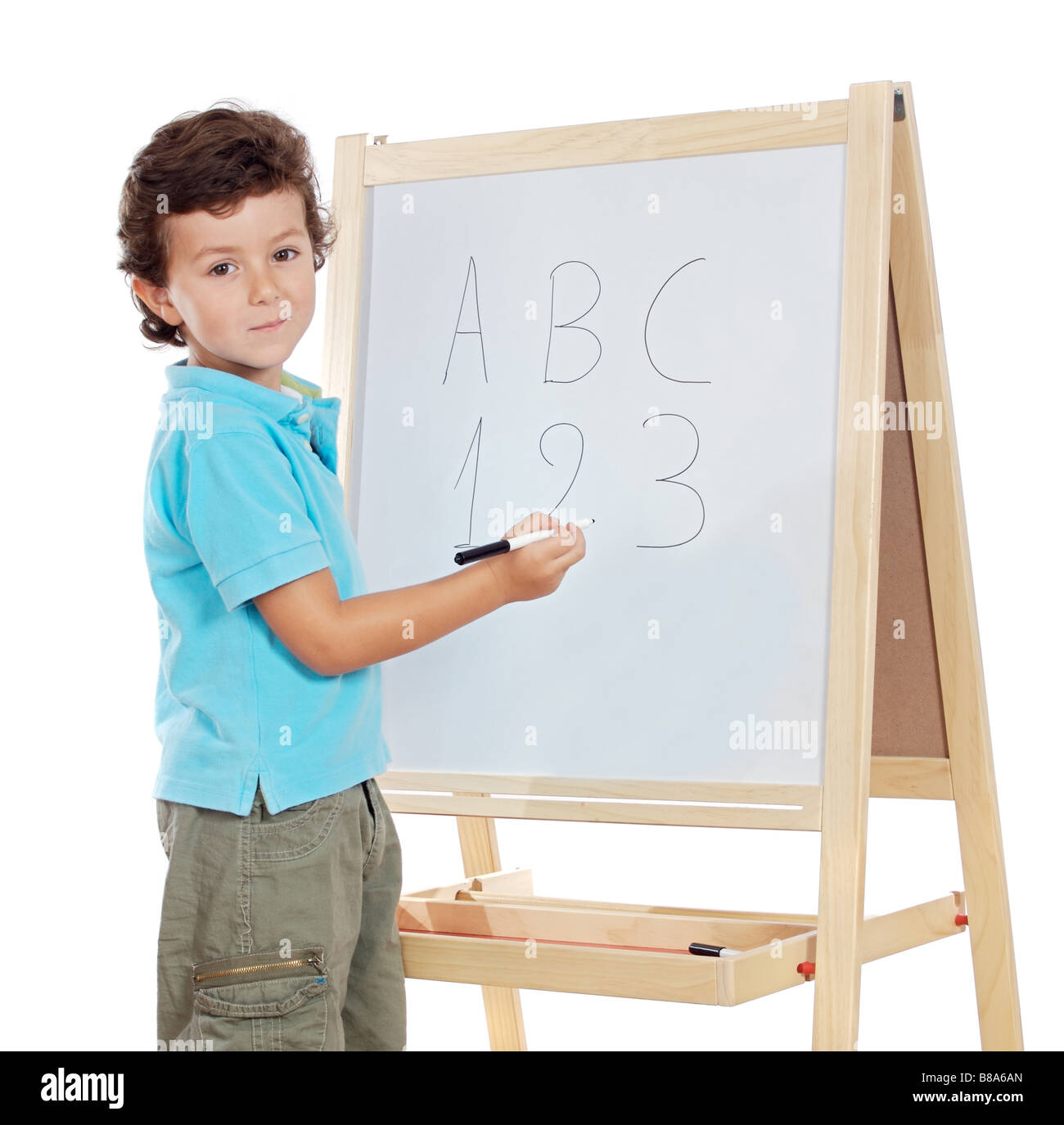 Beautiful boy with slate painting isolated over white Stock Photo - Alamy