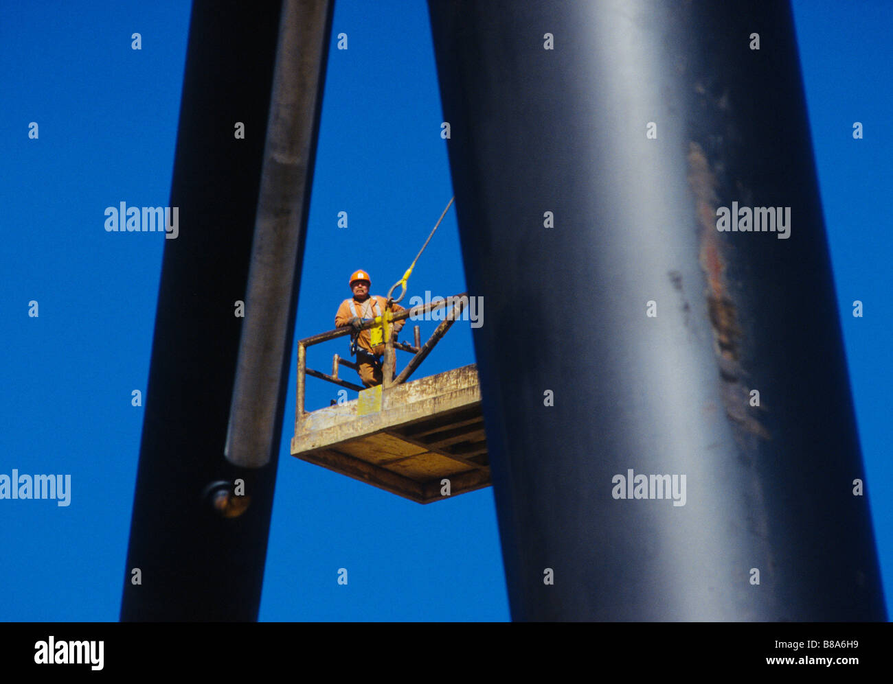 construction worker in crane basket Stock Photo - Alamy