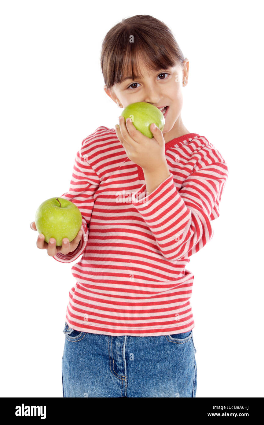 Beautiful girl eating an apple over white background Stock Photo - Alamy