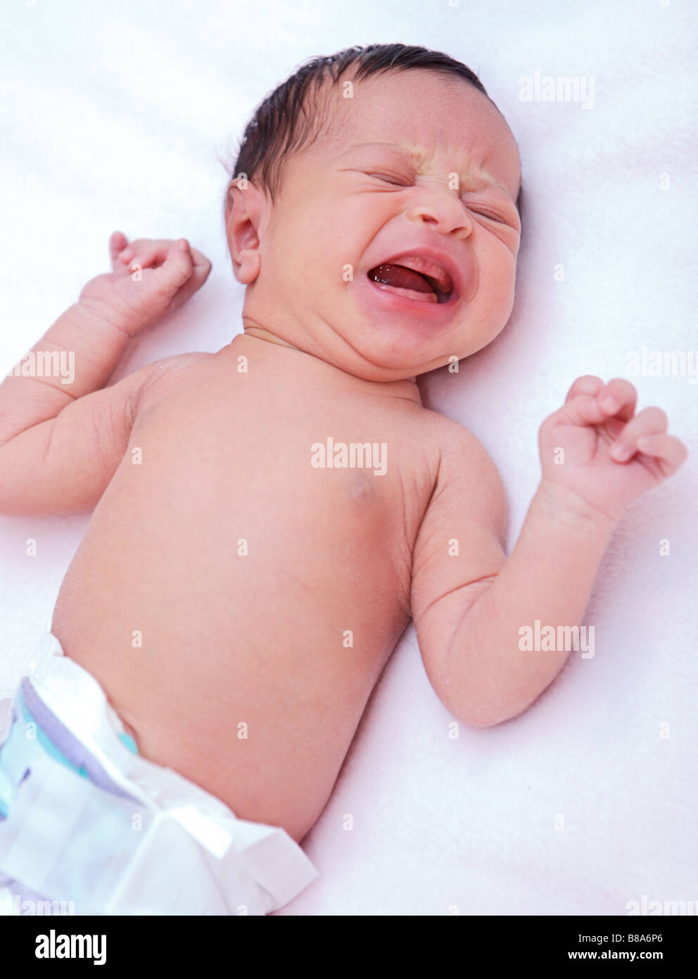 adorable new born baby crying and shouting Stock Photo - Alamy
