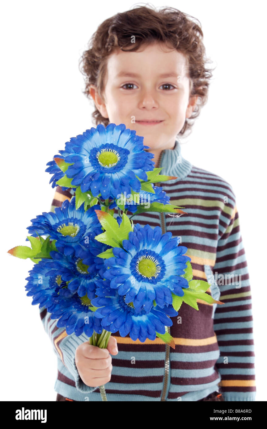 adorable boy with flowers focus in the flowers Stock Photo - Alamy