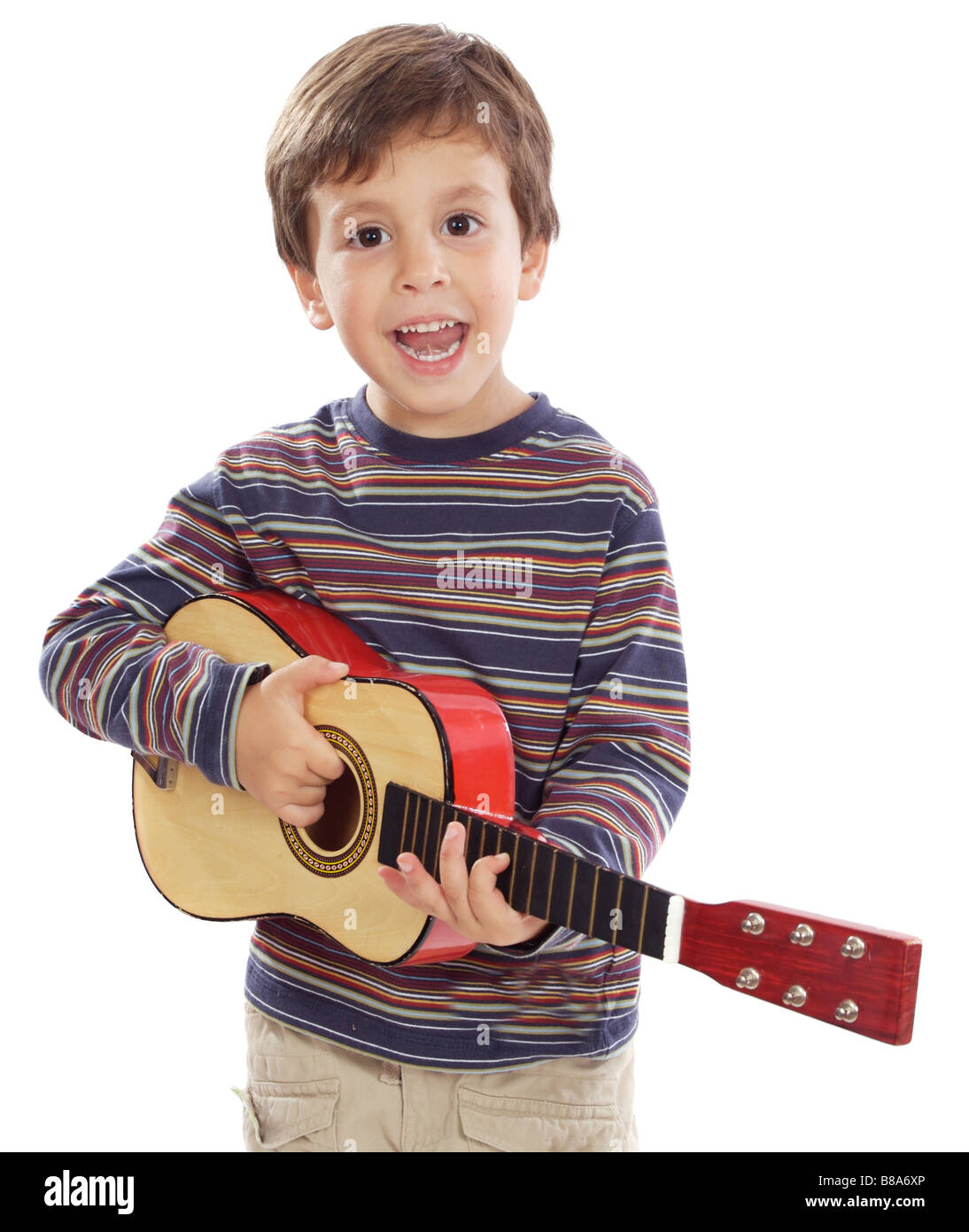 Kid with acoustic guitar a over white background Stock Photo - Alamy