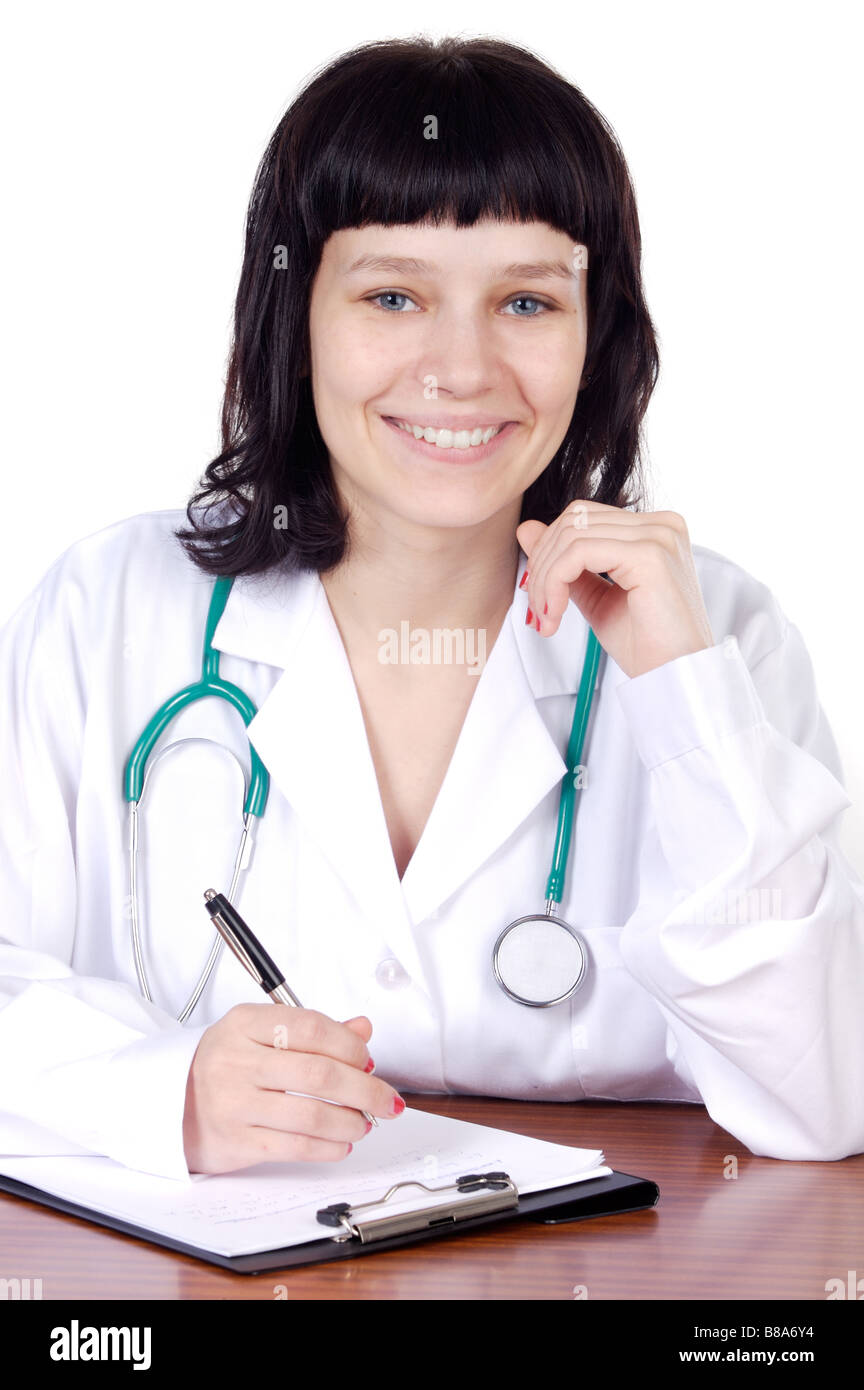 Attractive lady doctor over a white background Stock Photo - Alamy