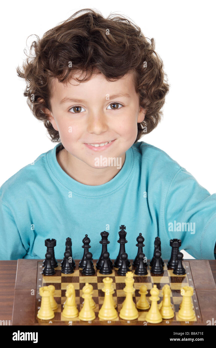 adorable boy playing the chess a over white background Stock Photo - Alamy
