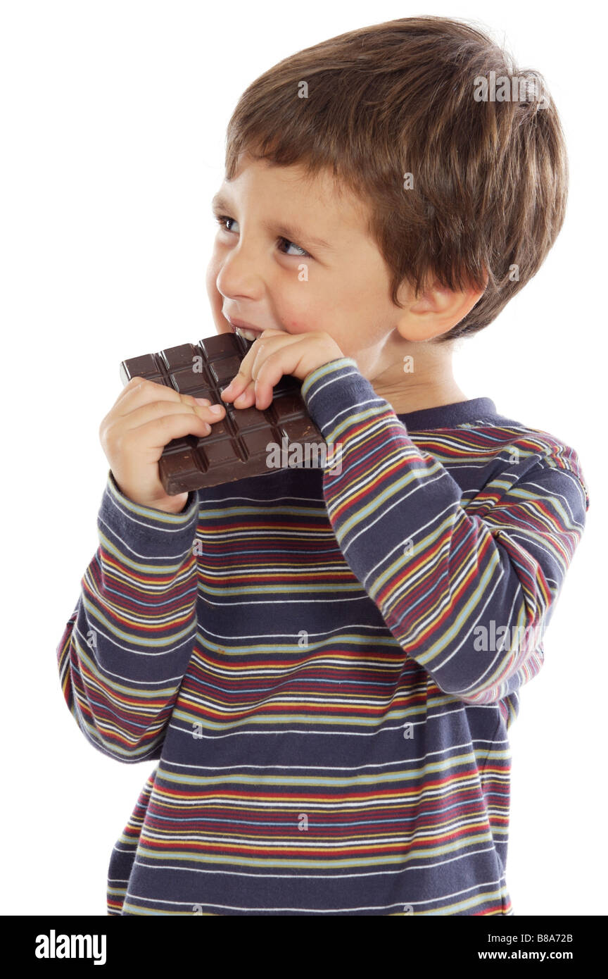 child eating chocolate a over white background Stock Photo - Alamy