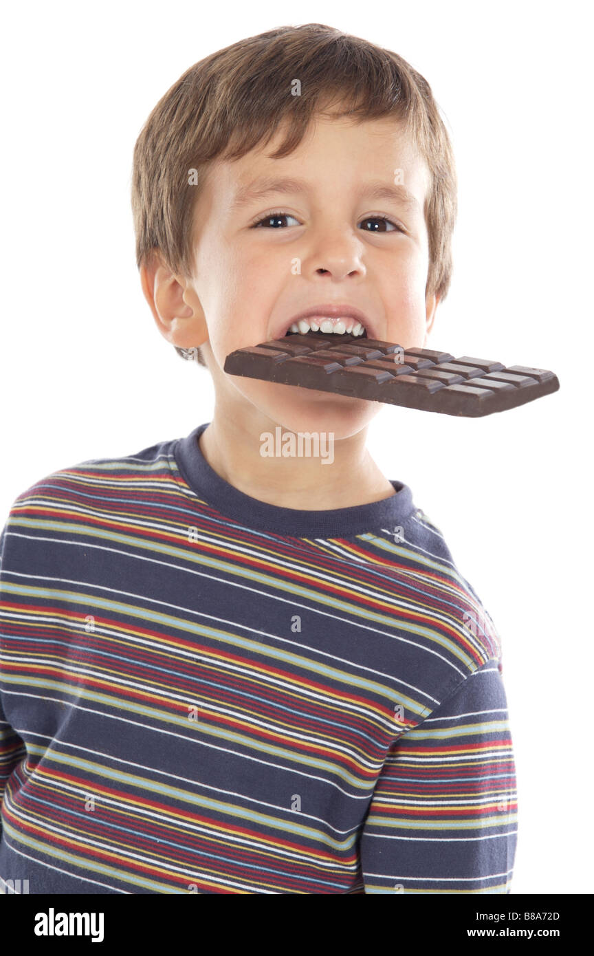 child eating chocolate a over white background Stock Photo - Alamy