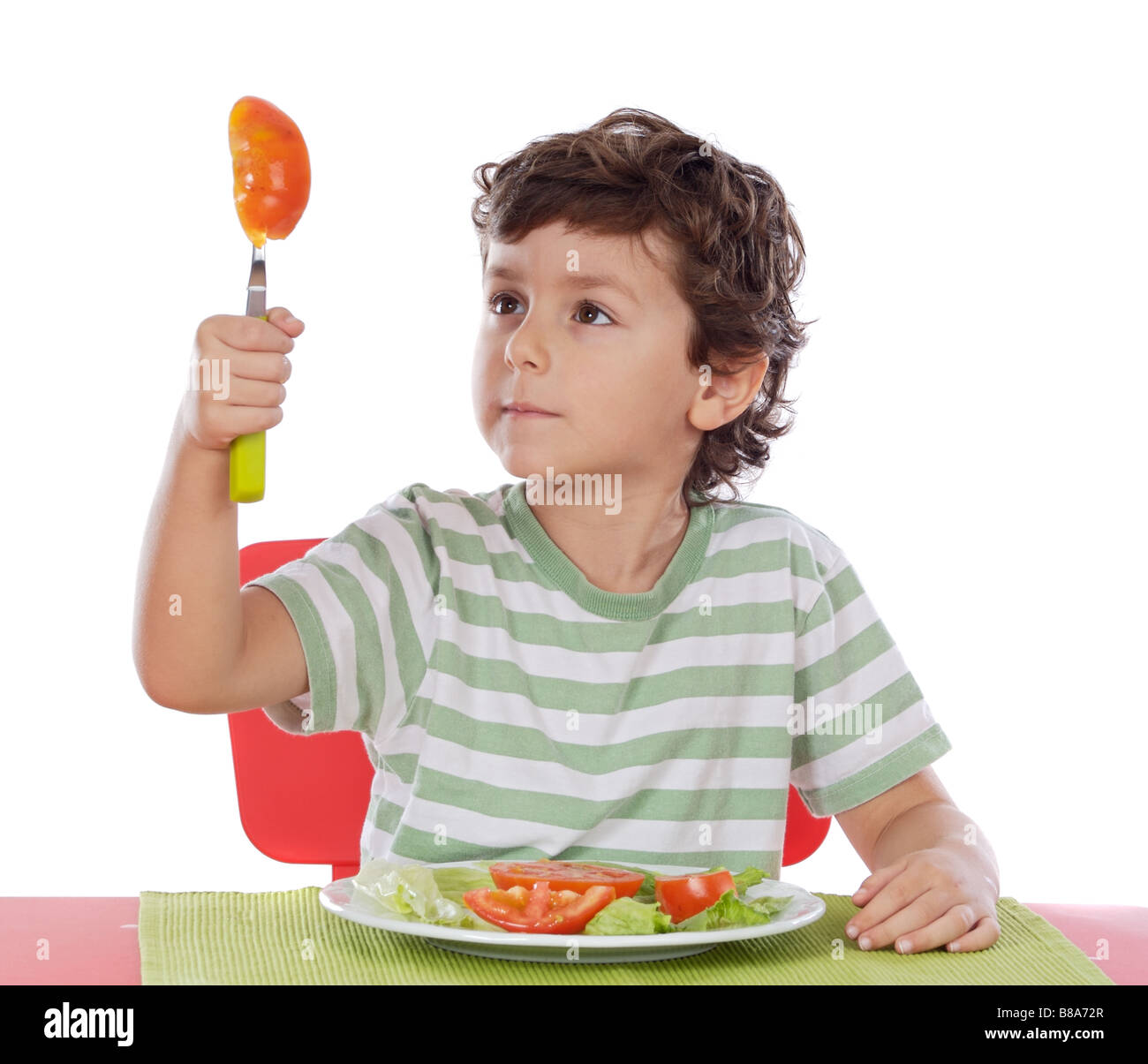 Healthy child eating balanced diet a over withe background Stock Photo ...