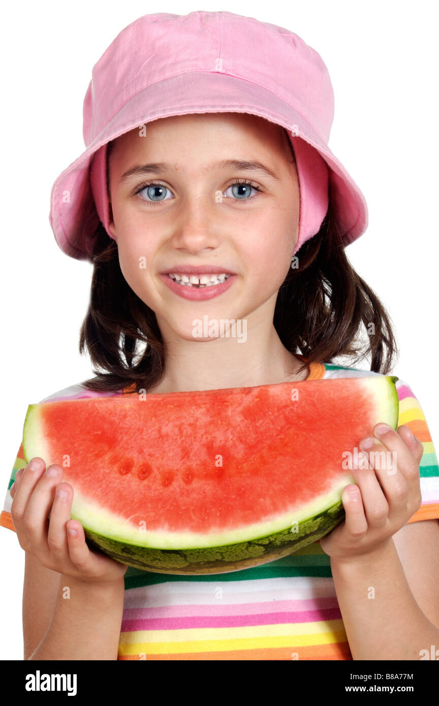 adorable girl eating watermelon a over white background Stock Photo - Alamy