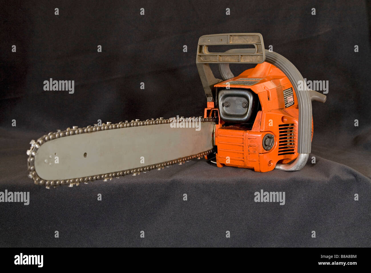 A wood cutter s chain saw or power saw Stock Photo - Alamy