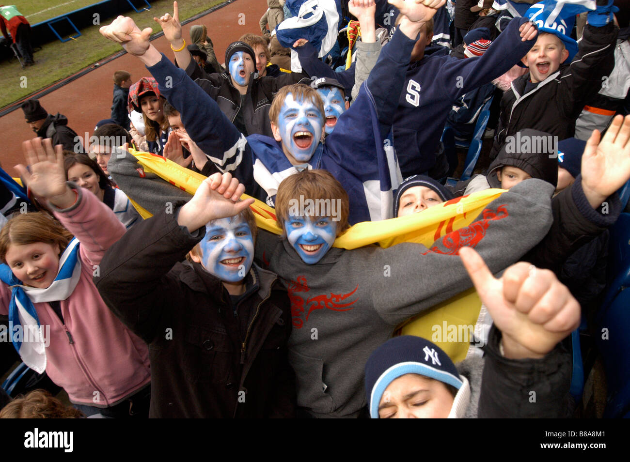Young Scottish fans celebrating at a Scotland v Italy rugby match Stock ...