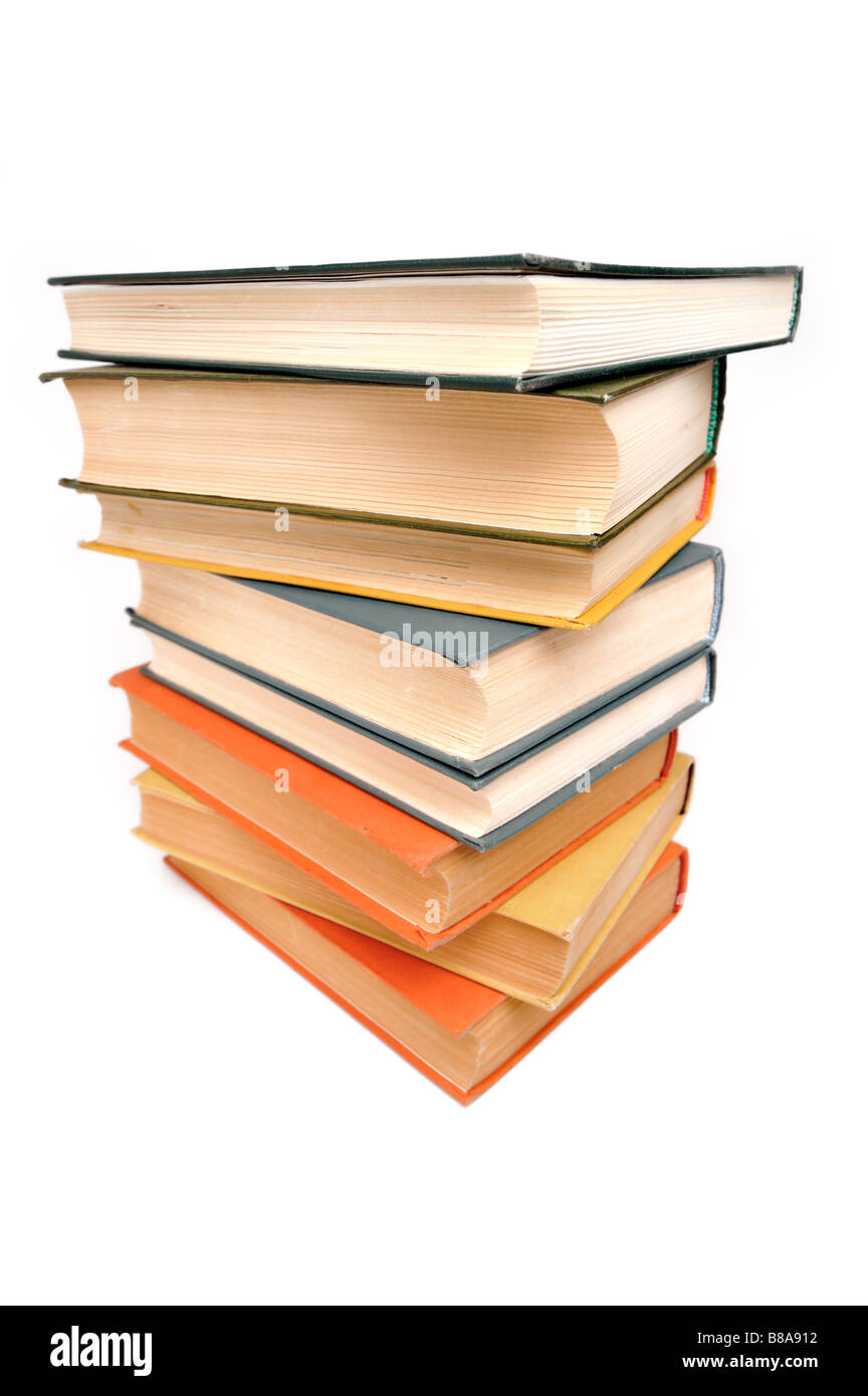 Stack of old books white background wide angle shot Stock Photo - Alamy