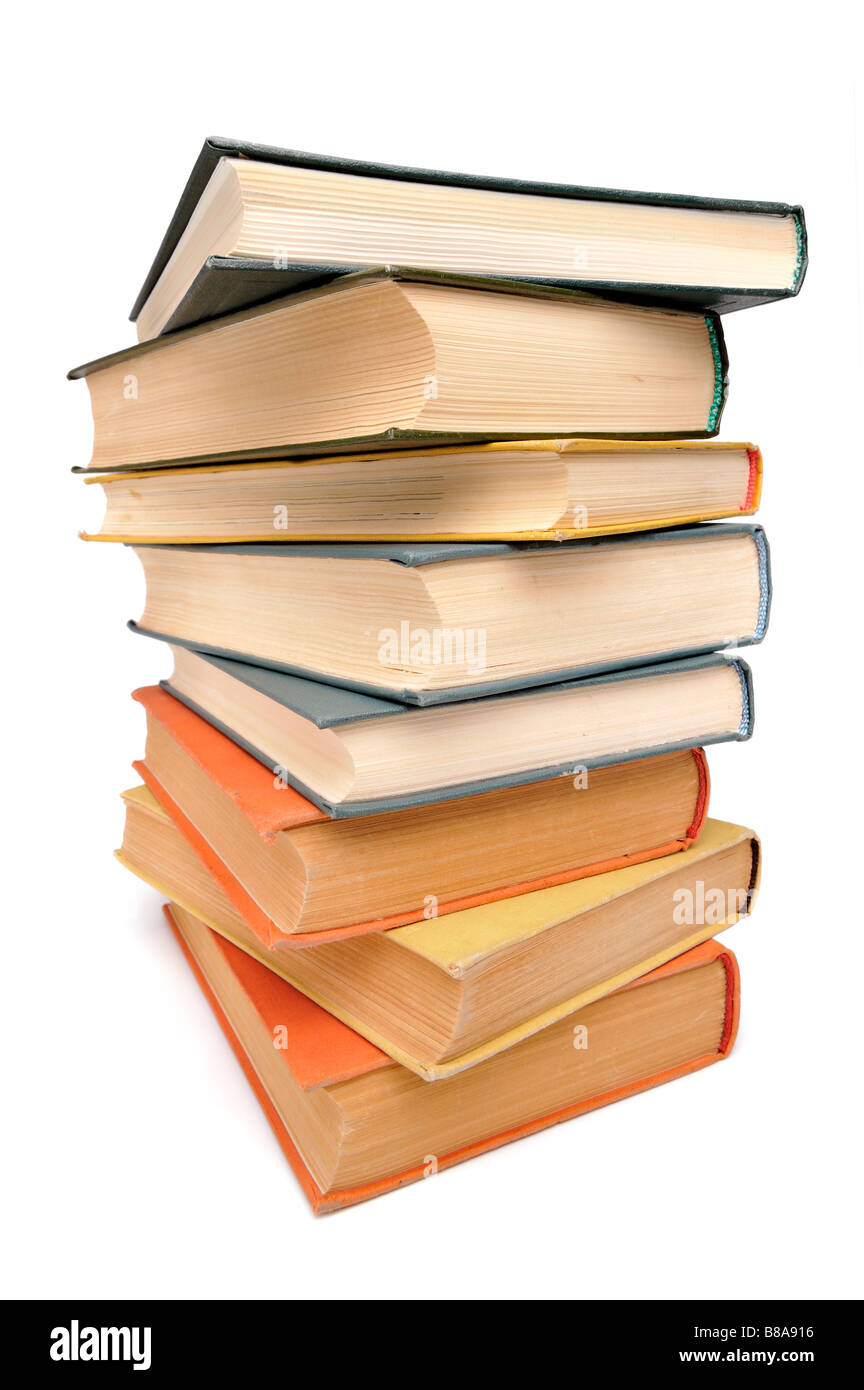 Stack of old books white background wide angle shot Stock Photo - Alamy