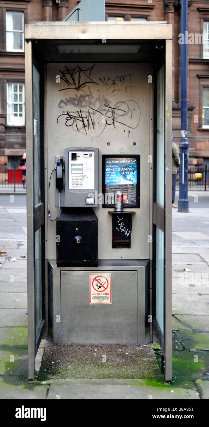 A telephone box with graffiti Stock Photo - Alamy