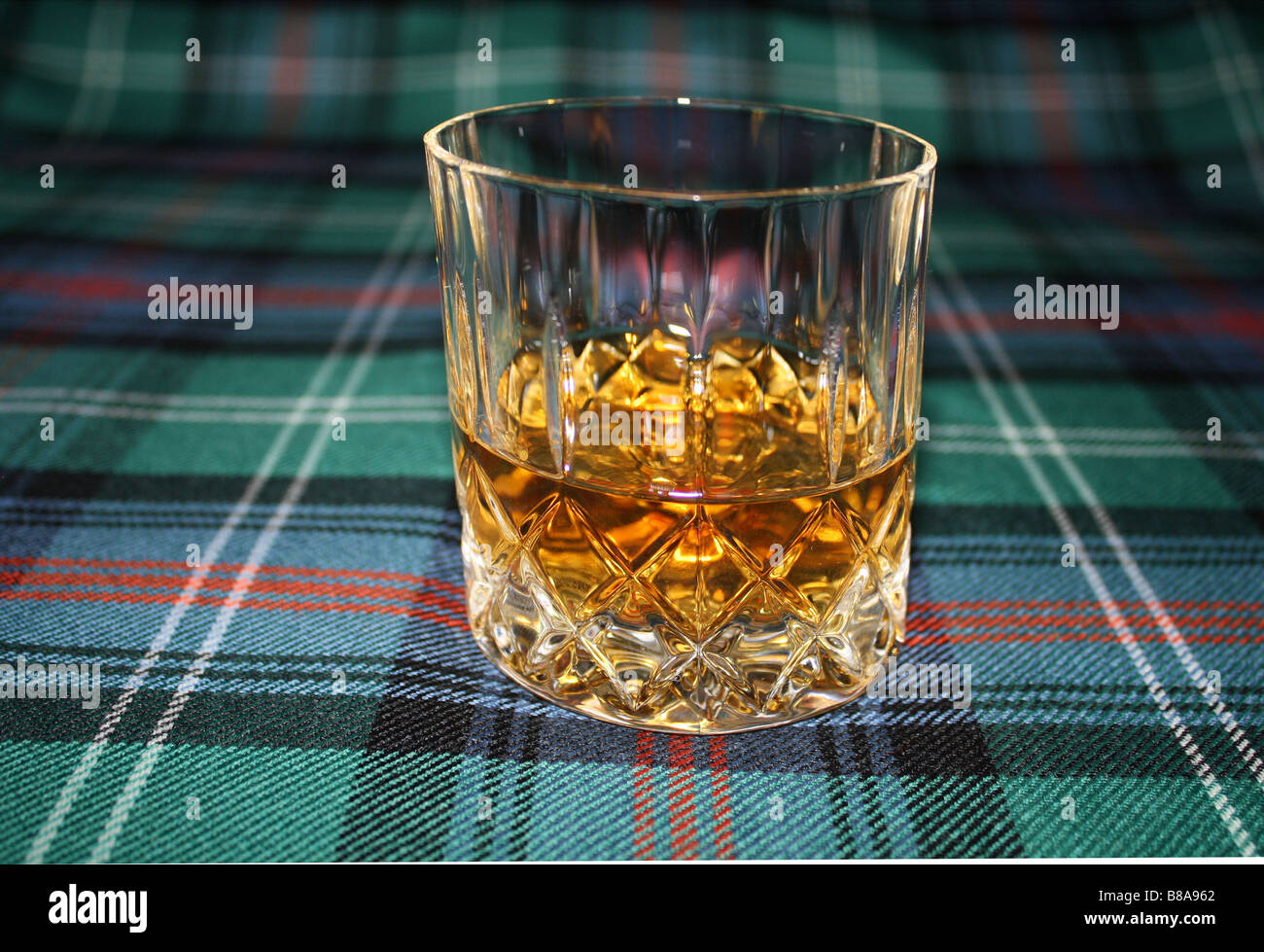 Glass of Whisky on Tartan Stock Photo - Alamy