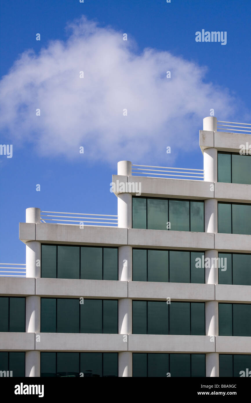 Architectural detail of modern office building with windows and rooftop ...
