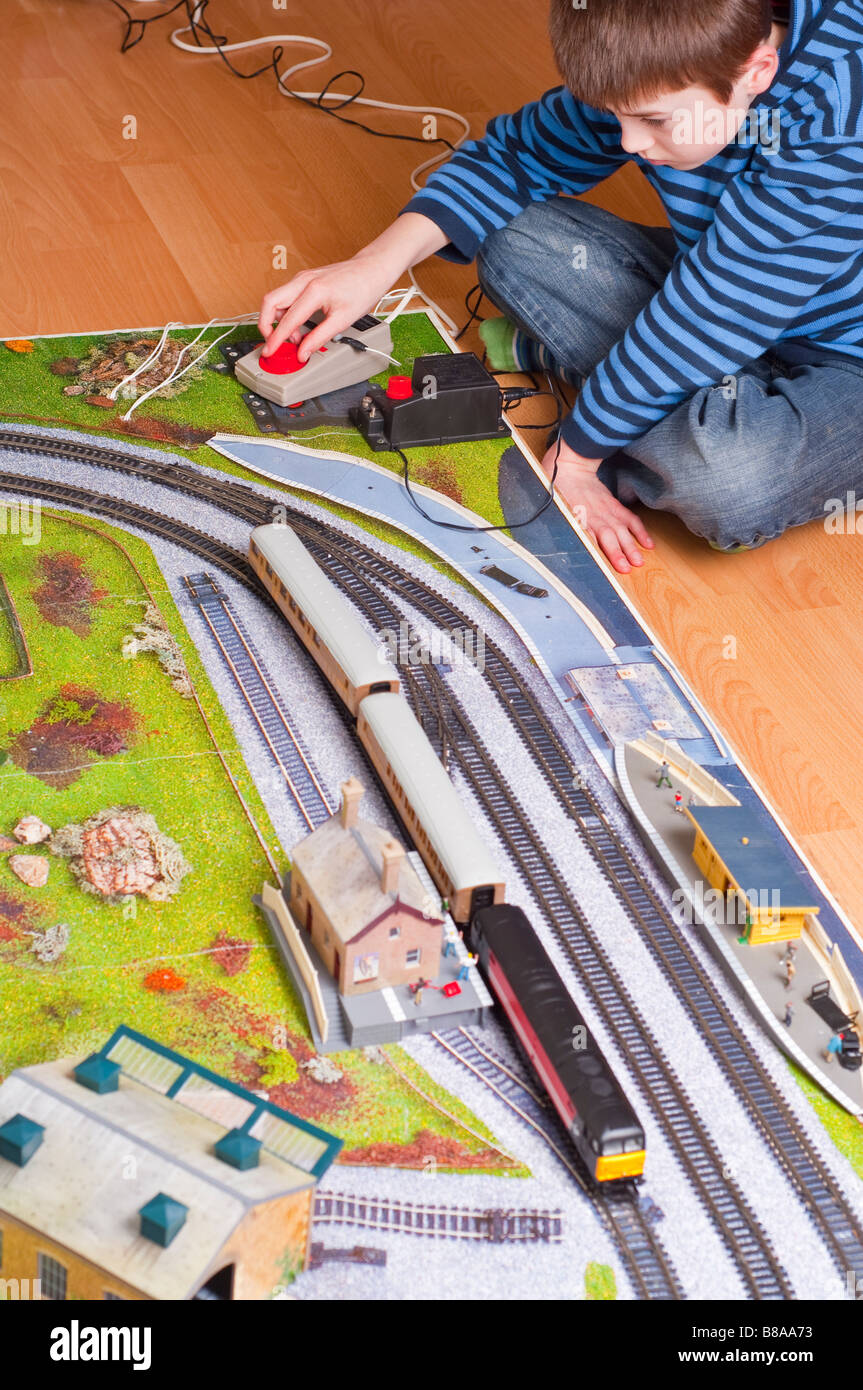 Boy playing model train set hi-res stock photography and images - Alamy