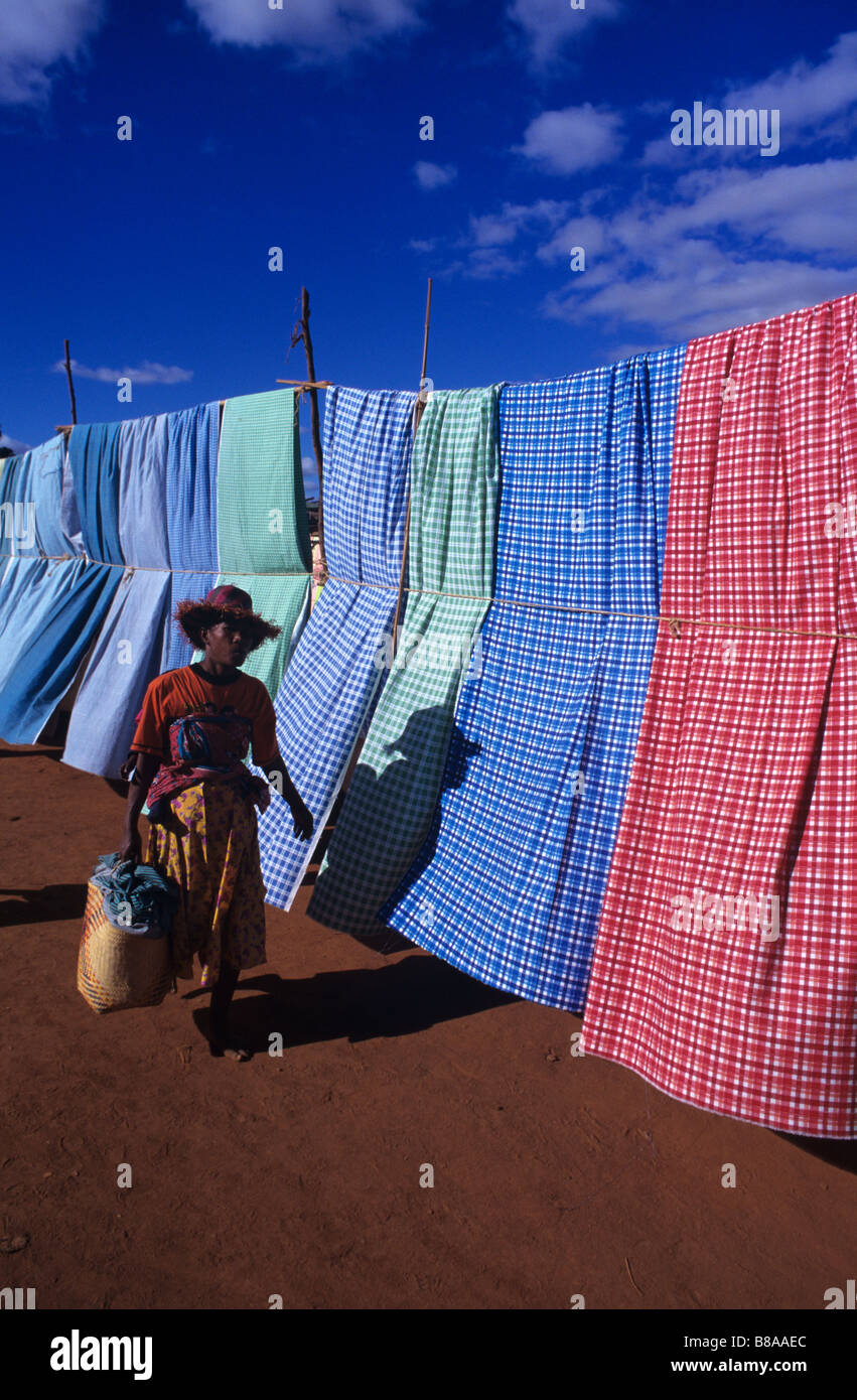 A Betsileo Woman Walks Past Cotton Drapes in the Cloth Market ...