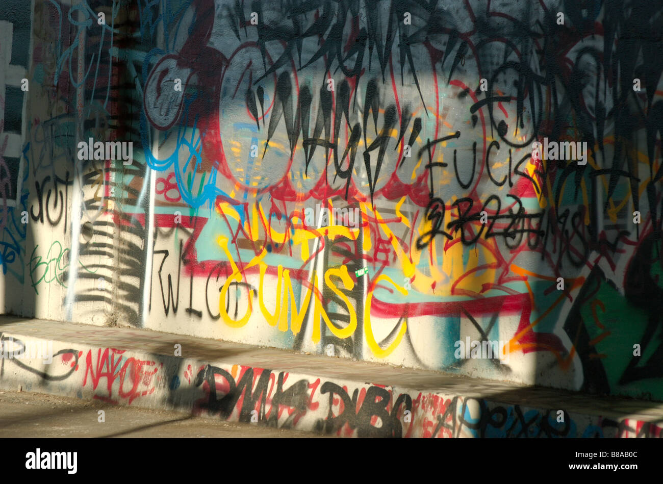 A graffiti mural painted on the underpass of a freeway Stock Photo - Alamy