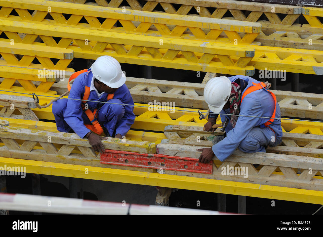 Two workers at construction site Stock Photo - Alamy