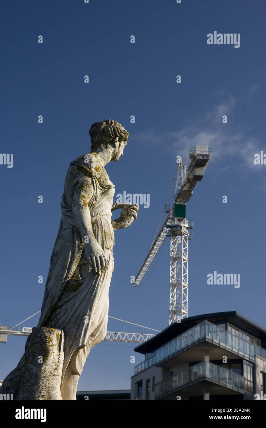 classical style statue versus modern architecture Stock Photo - Alamy