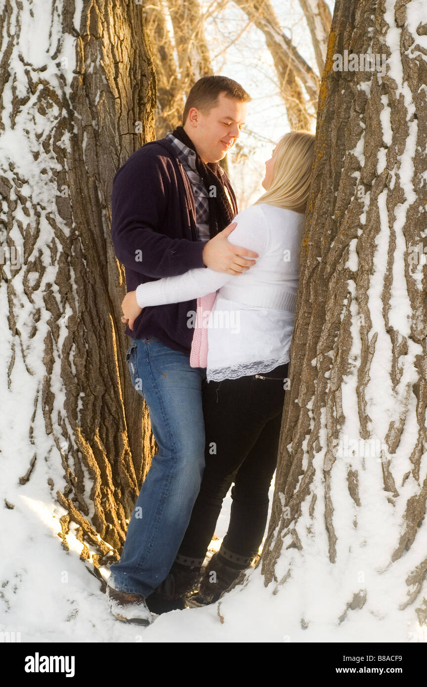 Young happy engaged couple Stock Photo - Alamy