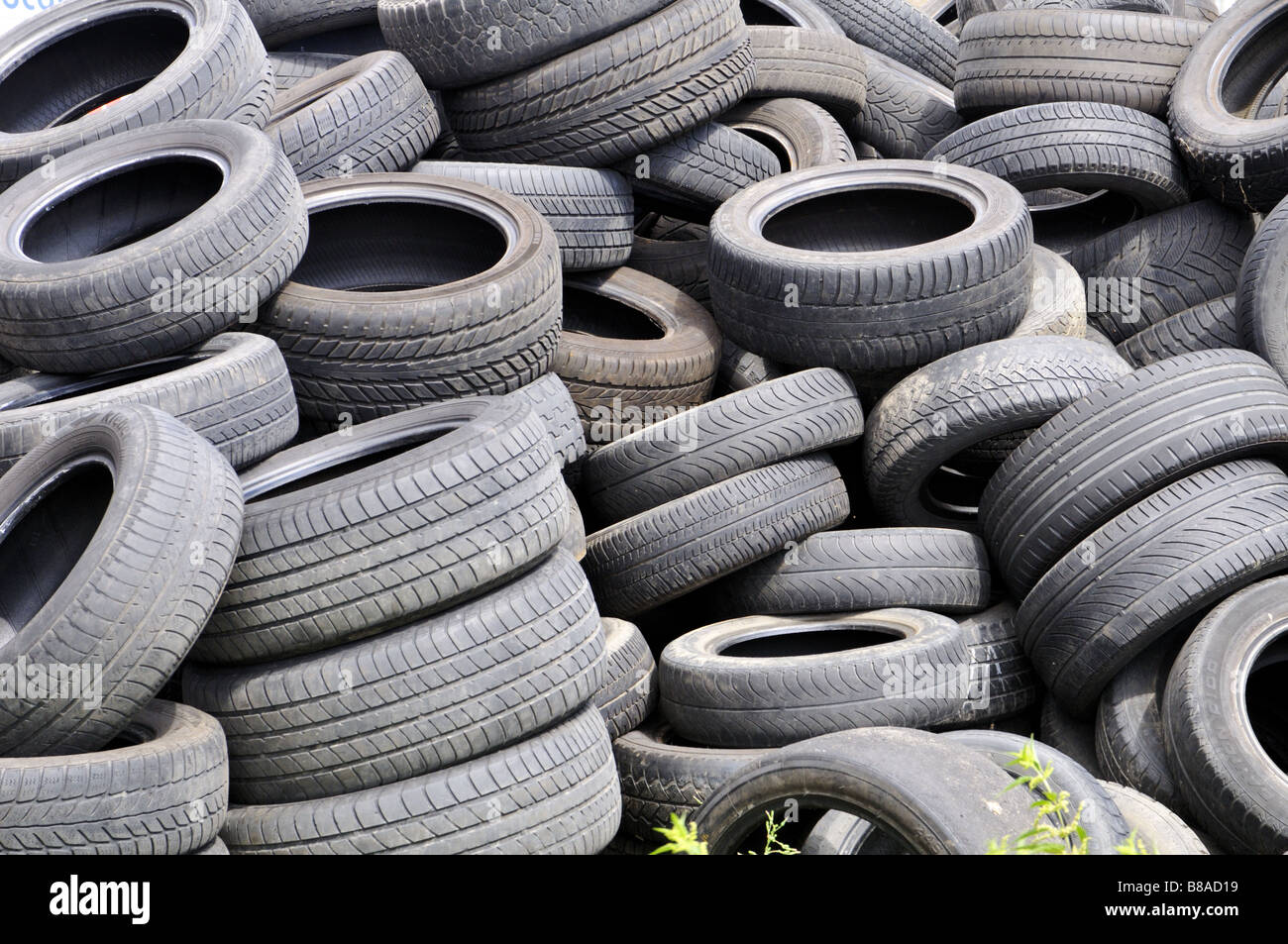 Pile of car tyres Stock Photo - Alamy