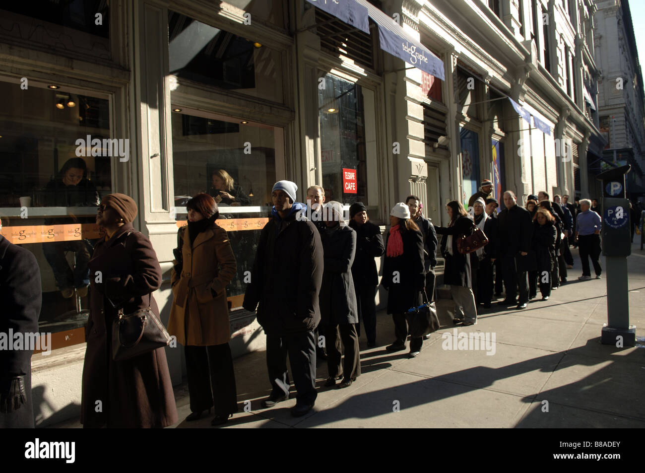 Hundreds of people line up in New York for a job fair sponsored by the ...