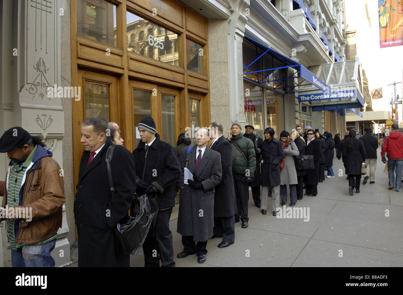 Hundreds of people line up in New York for a job fair sponsored by the ...