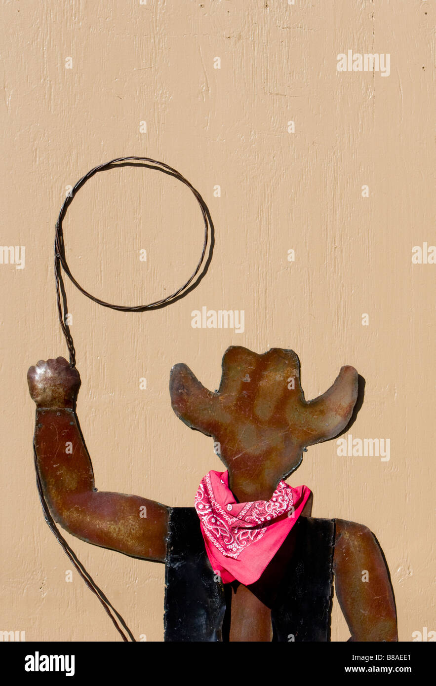 Rusty metal cowboy art with bandana Stock Photo - Alamy
