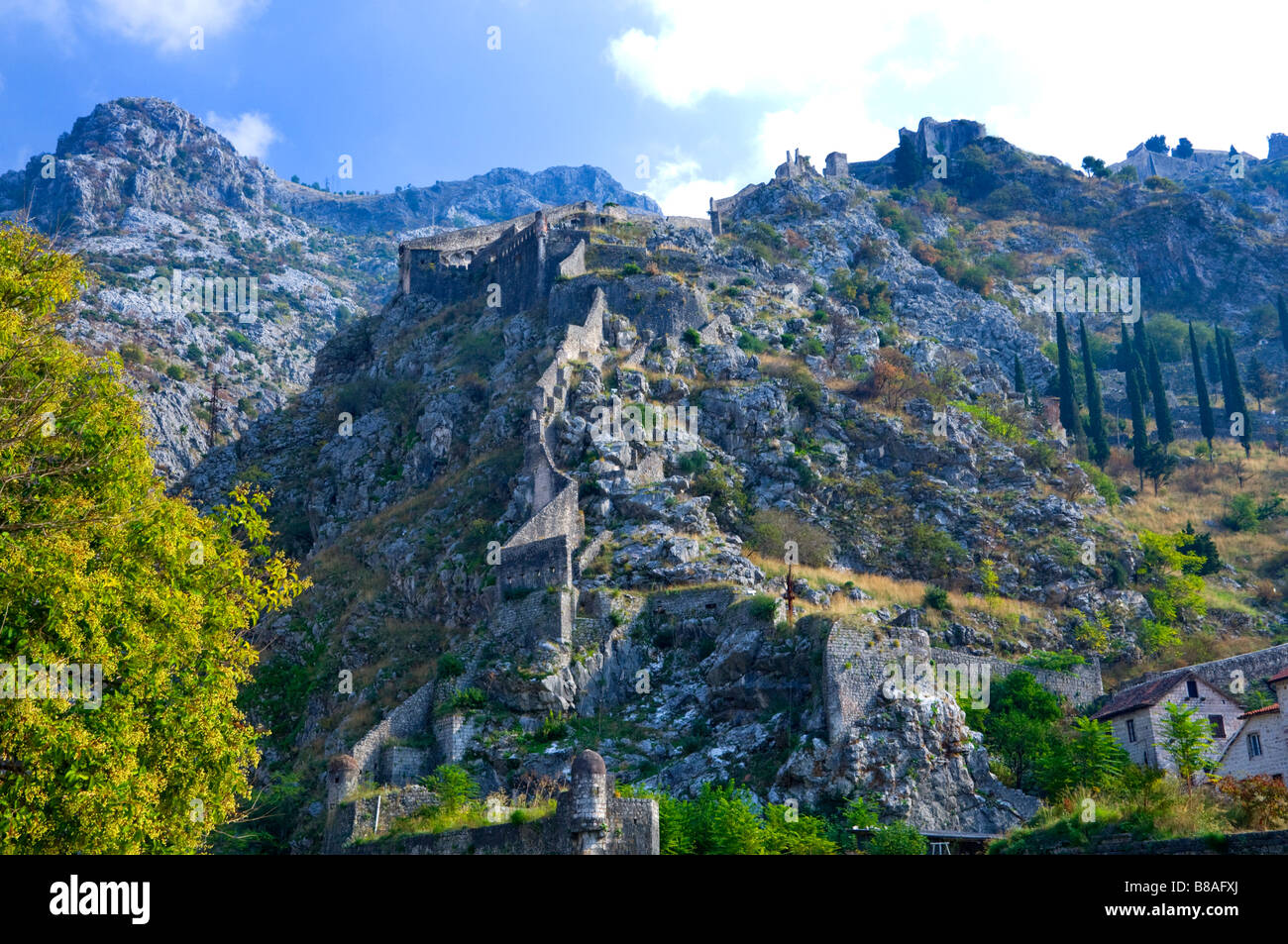 The medieval walled village of Kotor Montenegro with fortress on Lake ...