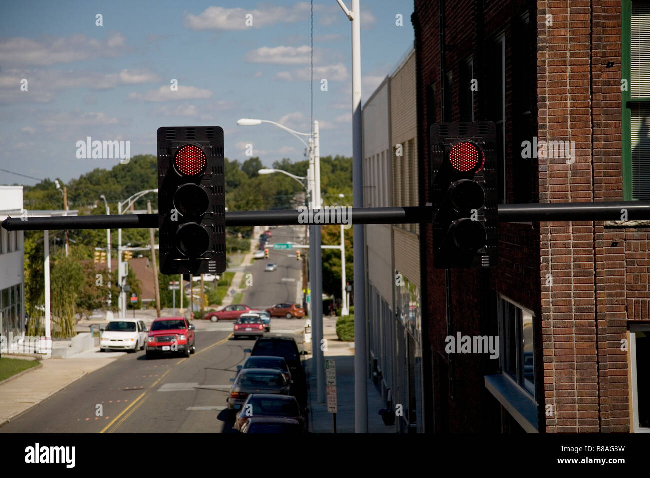 Photograph of a traffic signal which is red and the street below Stock ...