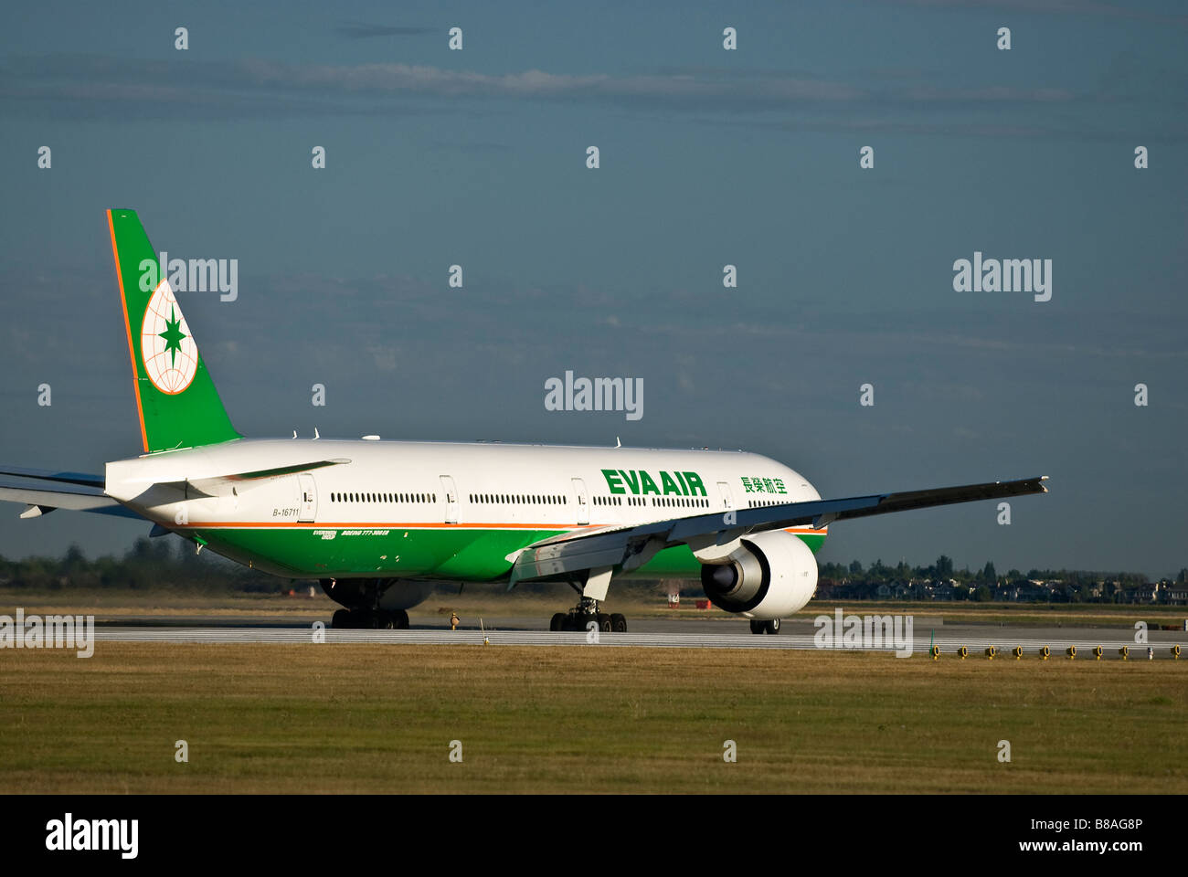 An EVA AIR Boeing 777-300ER lands at Vancouver International Airport ...