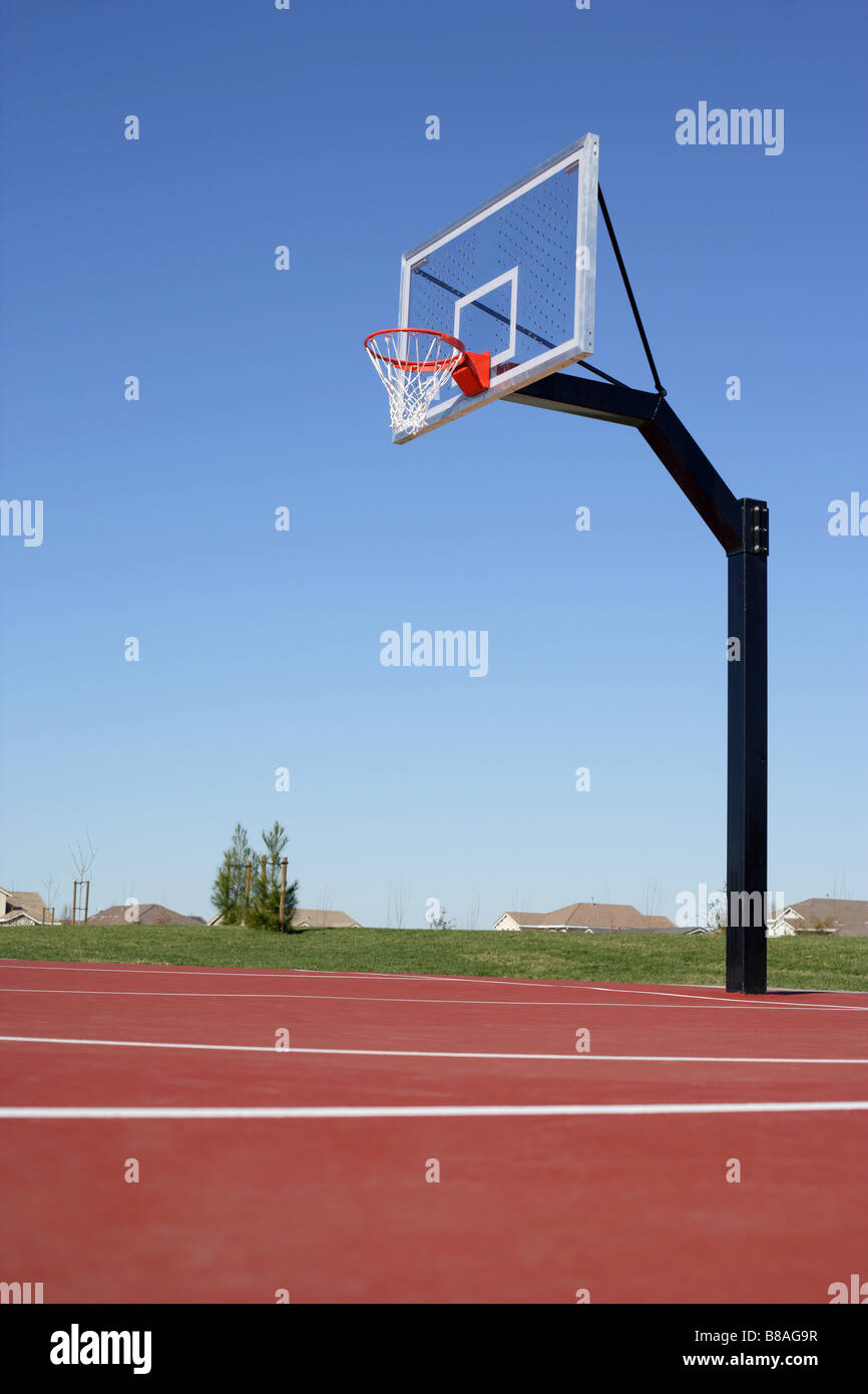 An outdoor basketball court in a park Stock Photo - Alamy