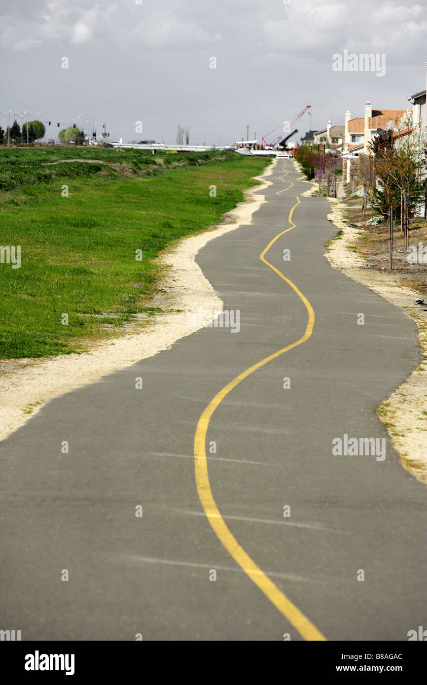 A bike path in a urban area Stock Photo - Alamy
