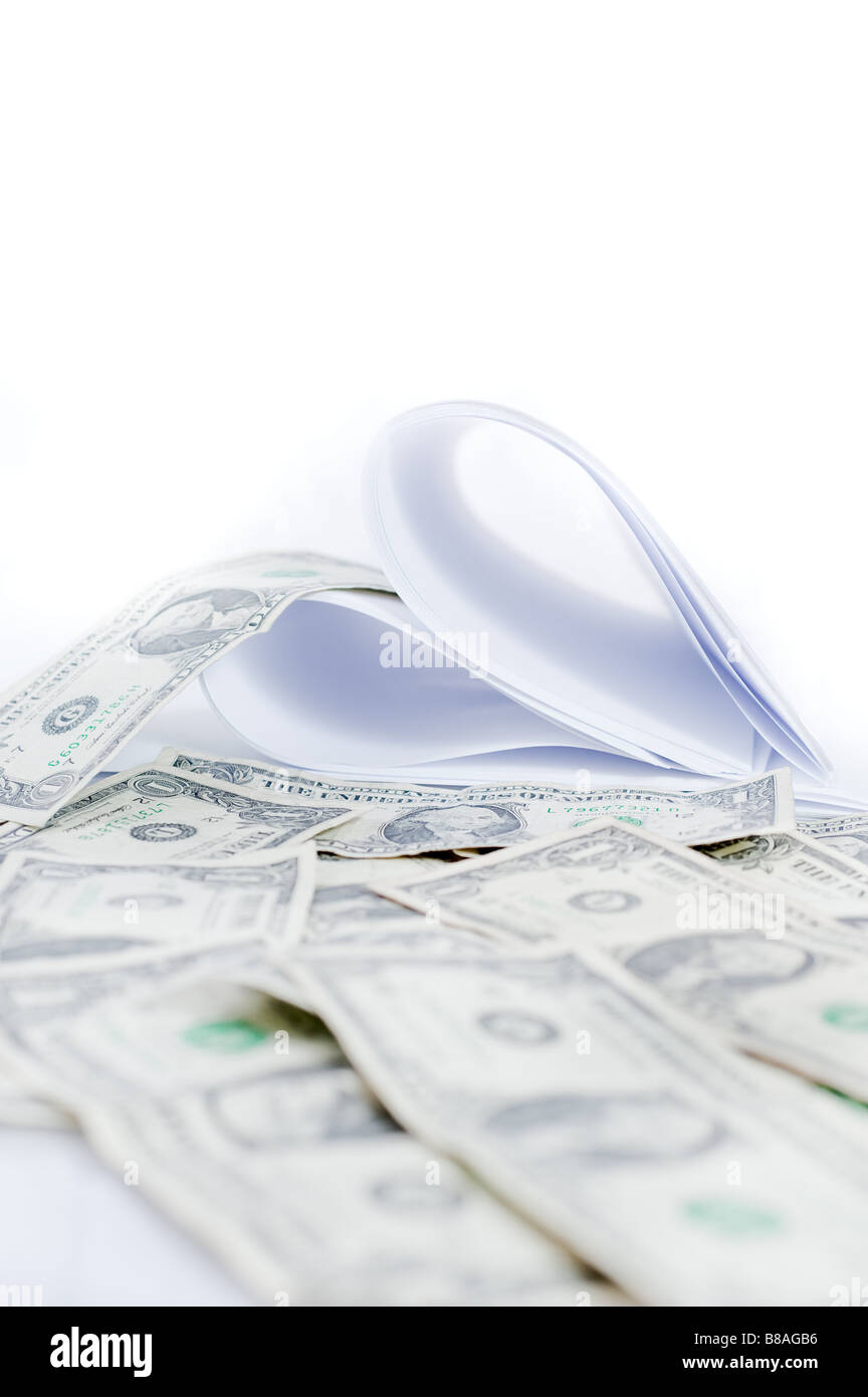 Money laid out with a heart shaped stack of paper Stock Photo - Alamy